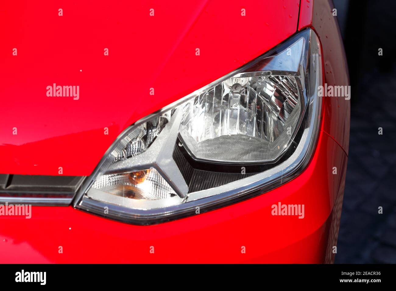 Modern headlight of a red car, Germany, Europe Stock Photo - Alamy