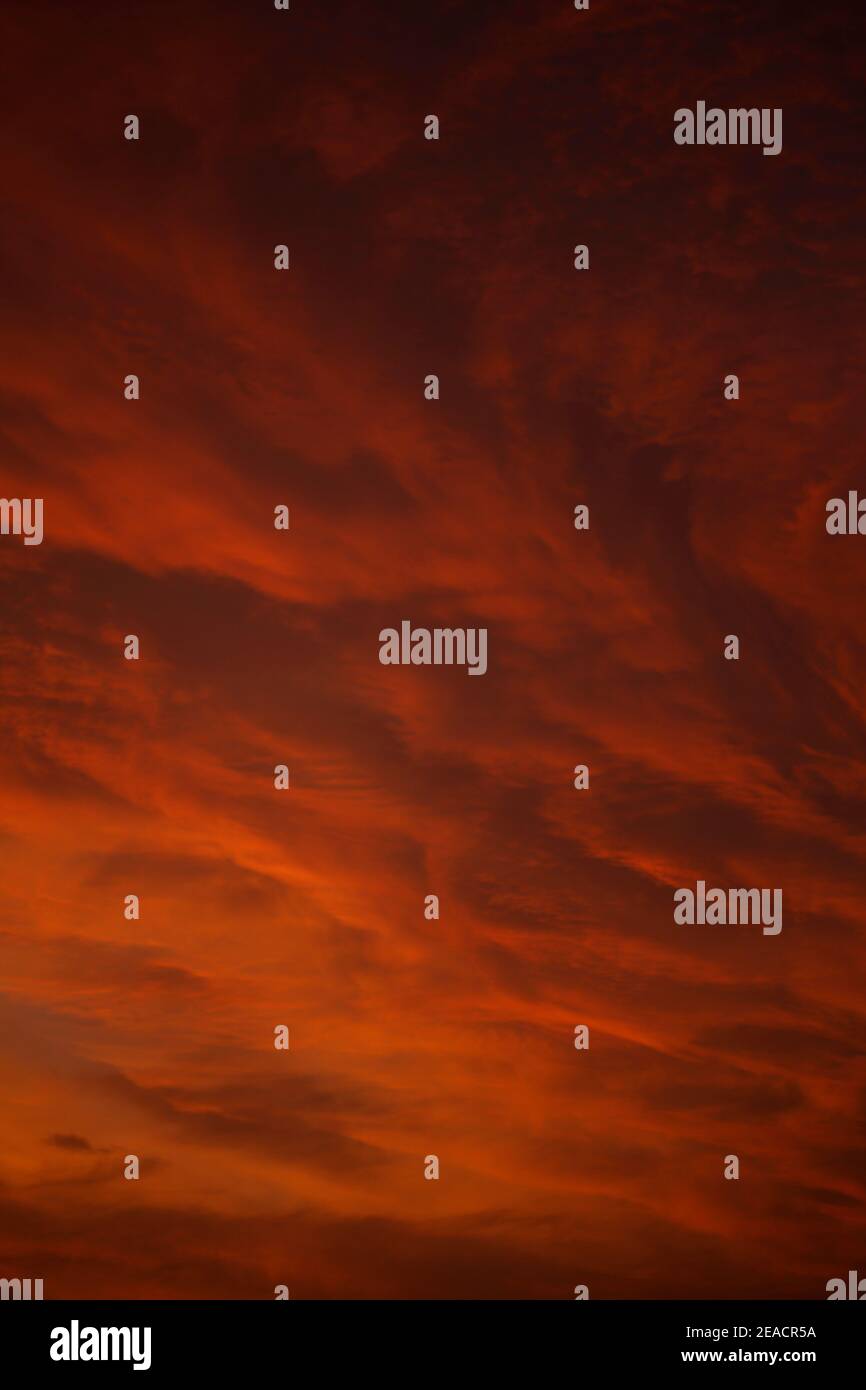 Fire-red cloudy sky, dawn, background image, Germany Stock Photo - Alamy