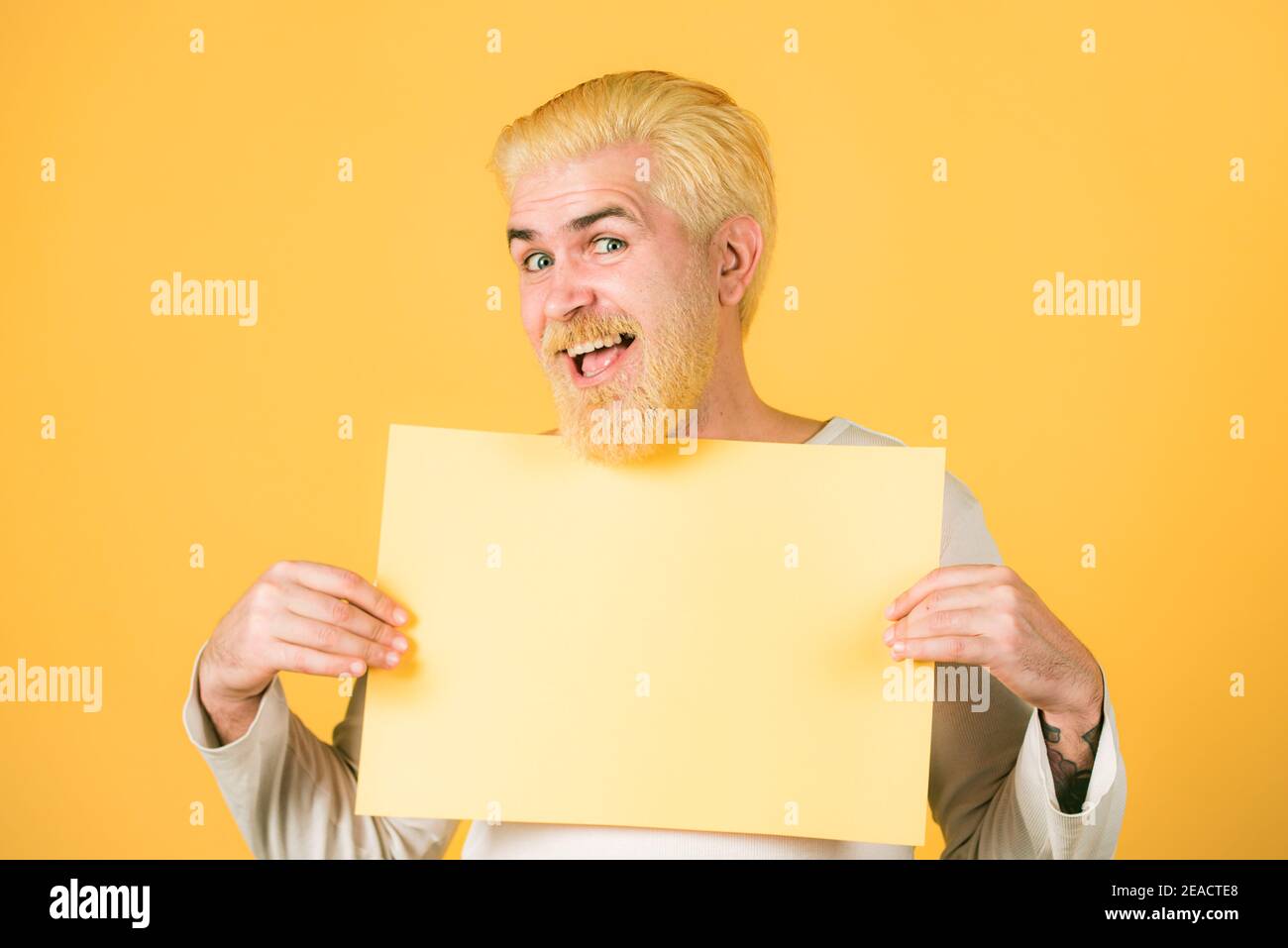 Season sales. Man holding empty placard board for media banner. Area ...