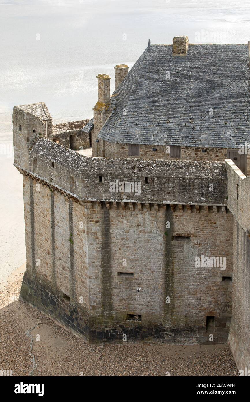 The defensive walls of Mont Saint Michele, having a broad top with a ...