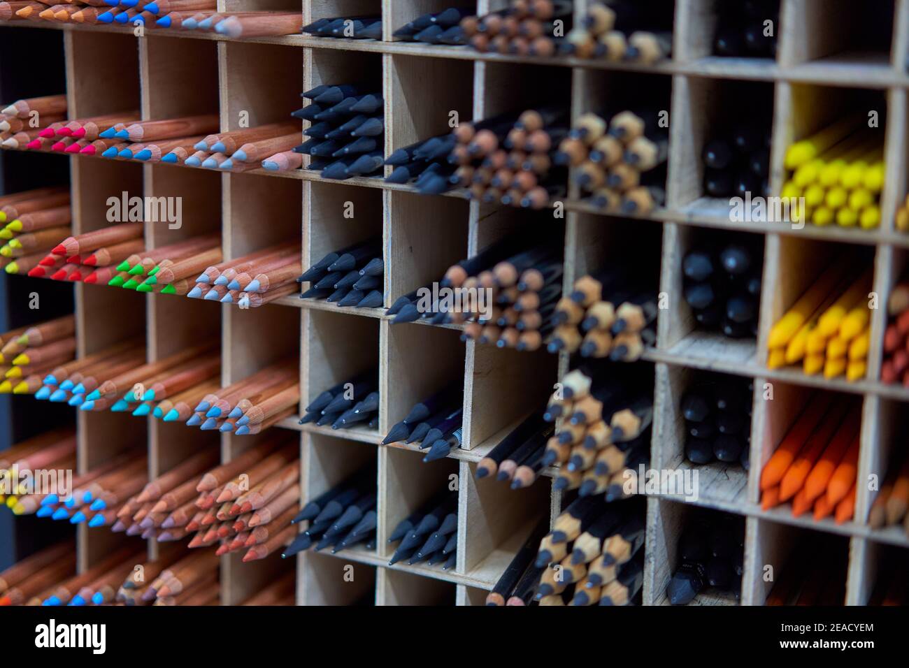Showcase with colored pencils for drawing in the store for artists or ...