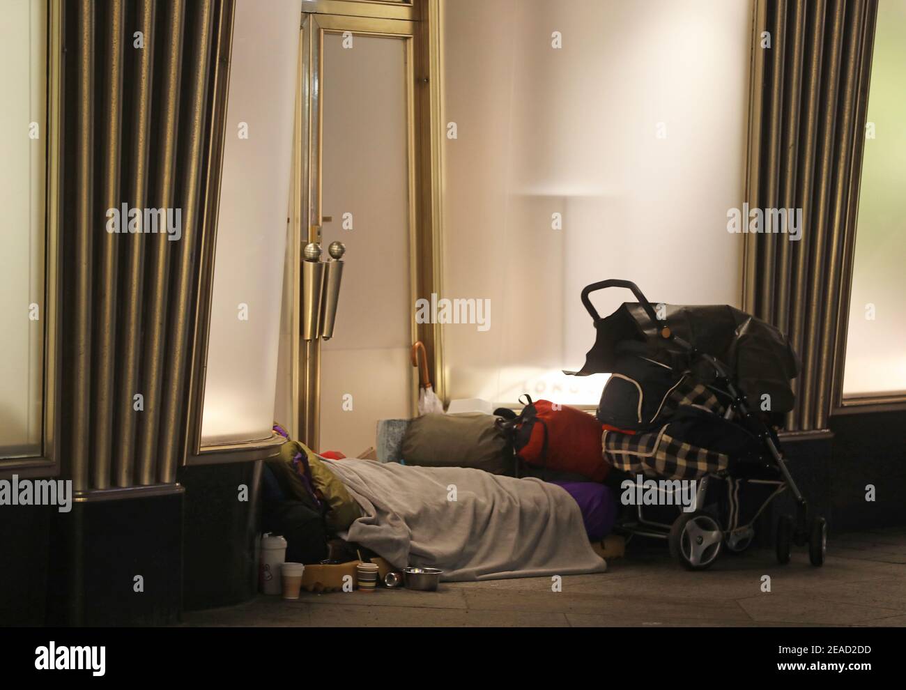Cologne, Germany. 09th Feb, 2021. A homeless person sleeps in front of ...