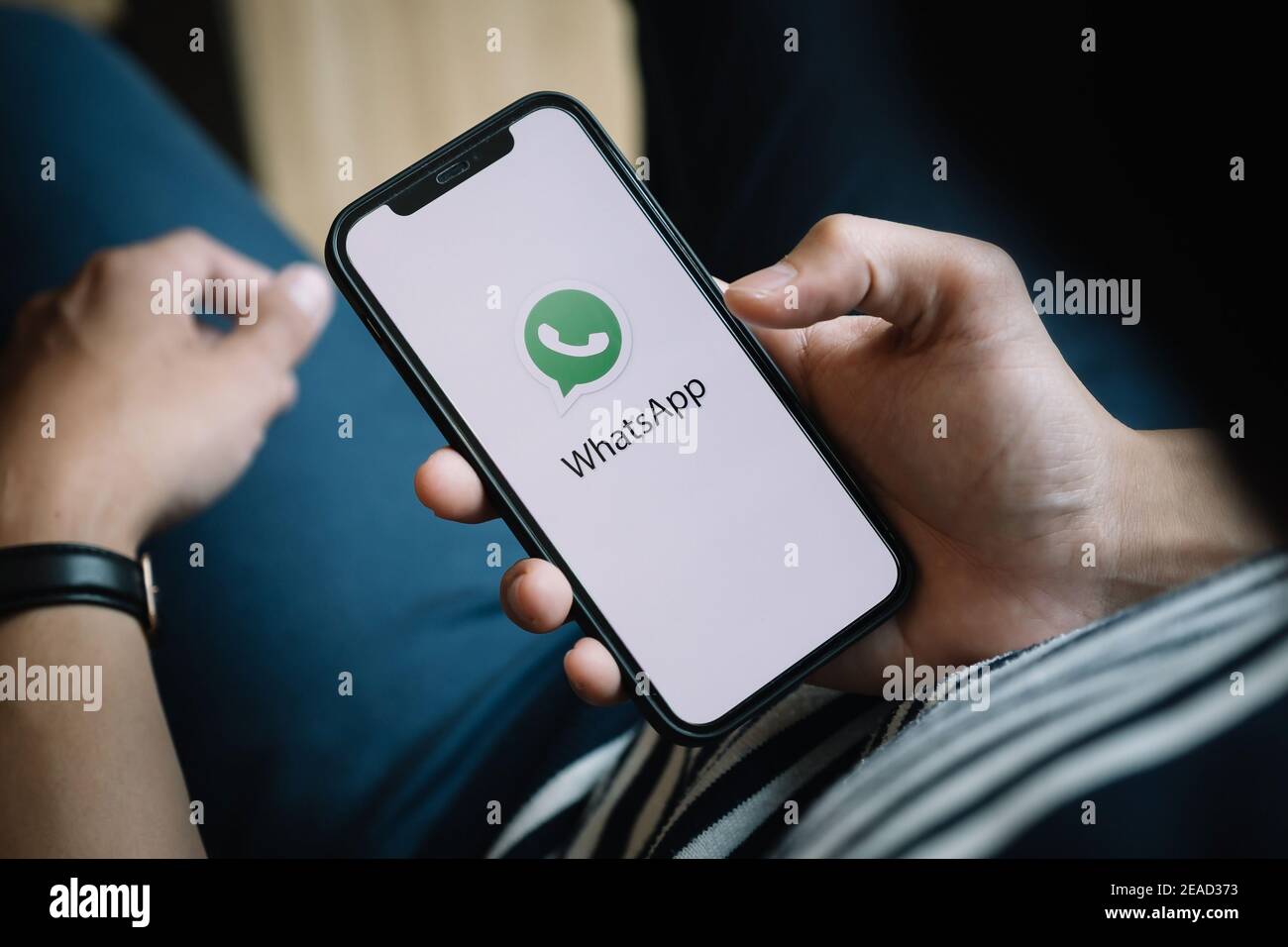 CHIANGMAI, THAILAND - JAN 23, 2021 : Male hand holding WhatsApp mobile ...