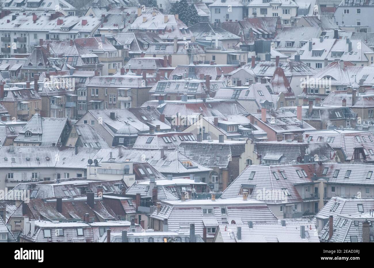 Stuttgart, Germany. 09th Feb, 2021. Snow is on rooftops downtown ...