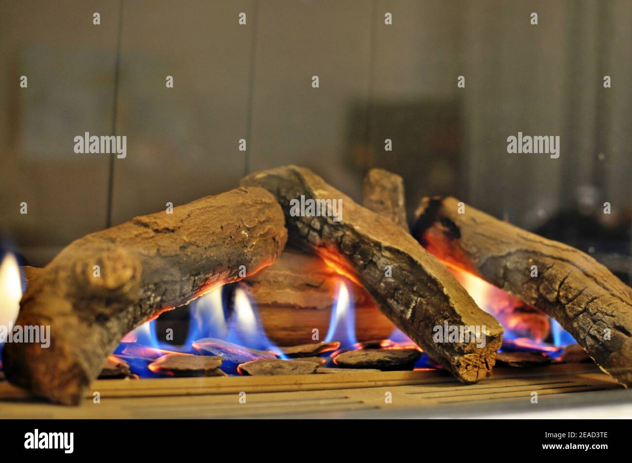 Close up of a fireplace at home in interior with contrast and copy text ...