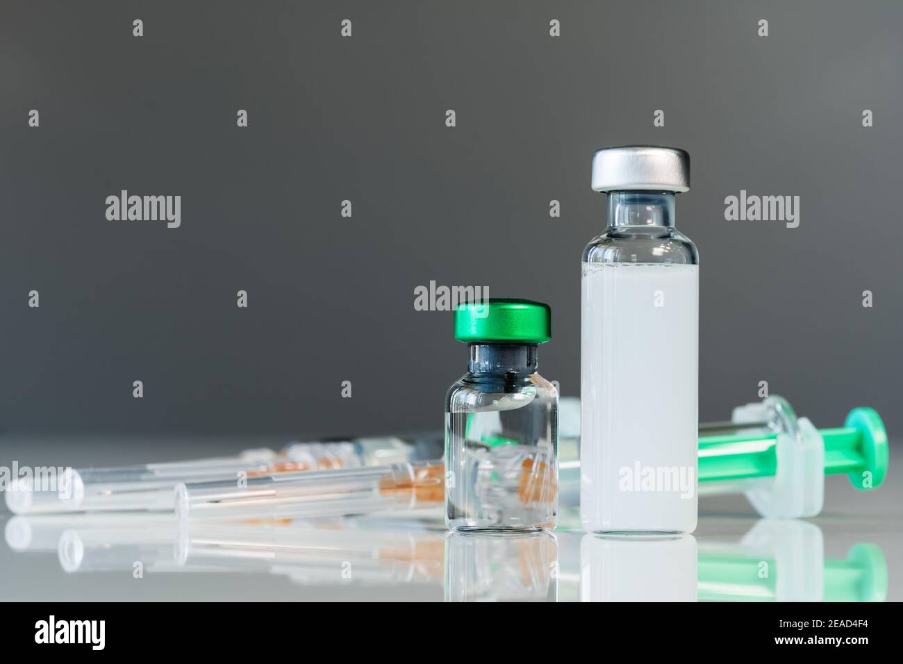 vaccine bottle and syringe injection medicine Stock Photo - Alamy