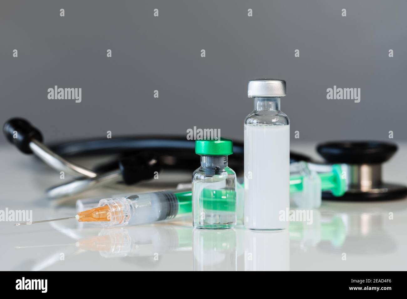 vaccine bottles and syringe injection medicine and stethoscope Stock ...