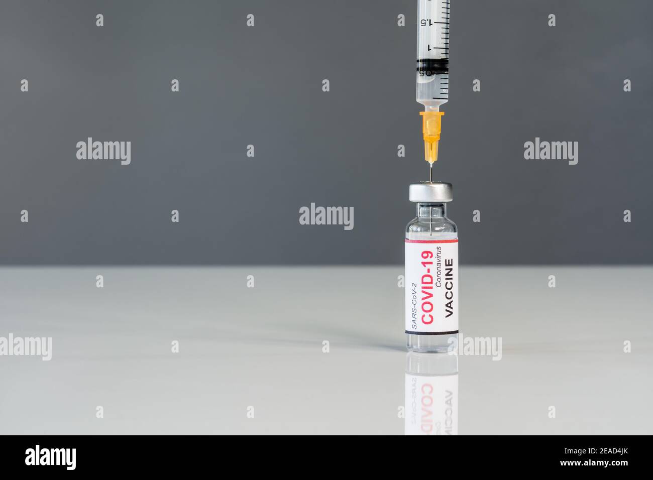 medical syringe needle drawing Coronavirus (Covid-19) vaccine shot from ...