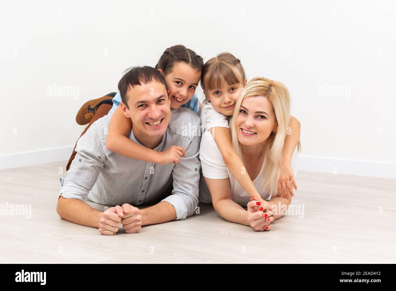 concept housing a young family. mother father and children in a new ...