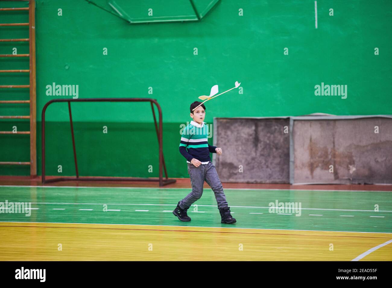 Boy launching airplane hi-res stock photography and images - Alamy