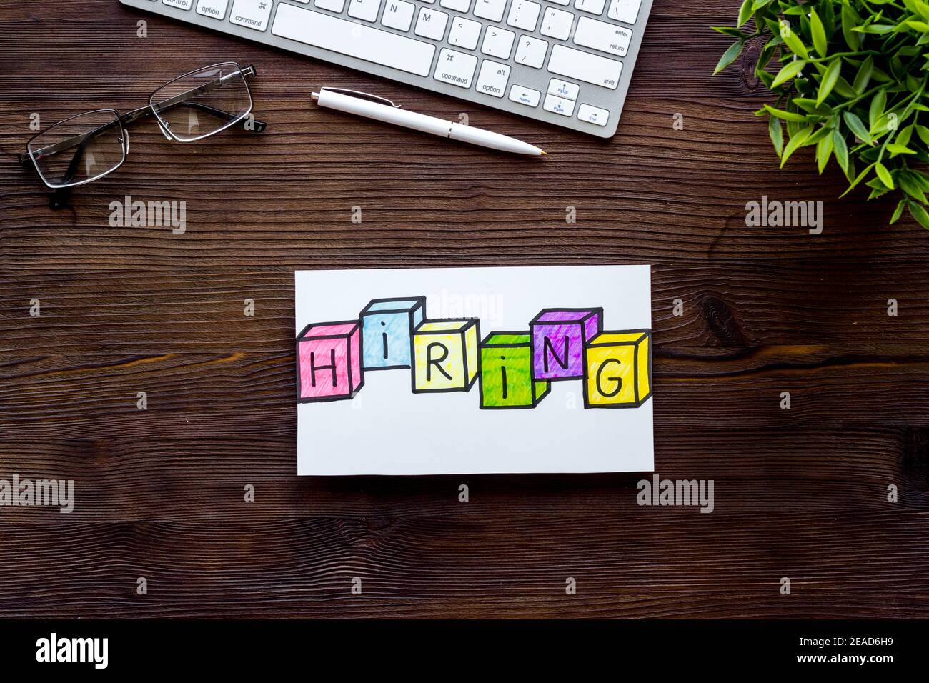 Hiring - - job recruting concept. Word Hiring on the working table. Top ...