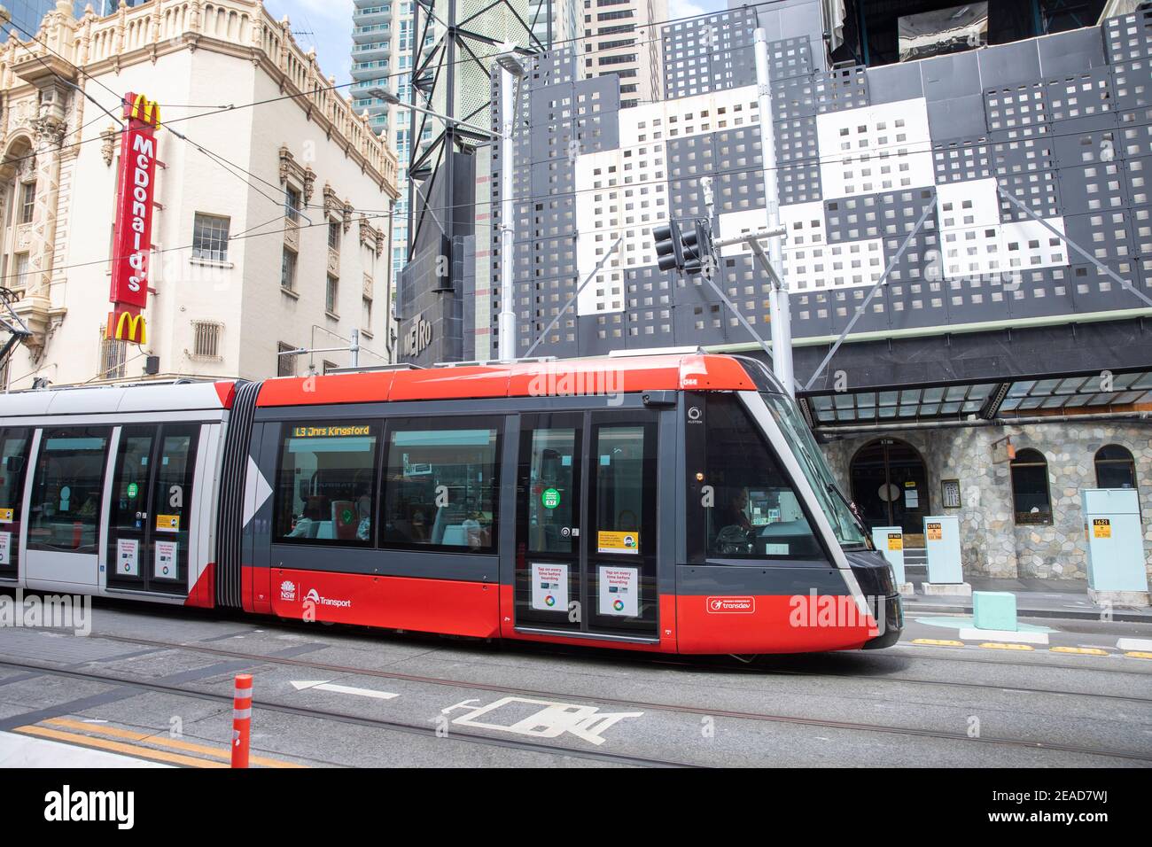 Sydney light rail train passing Mcdonalds restaurant on George Street ...