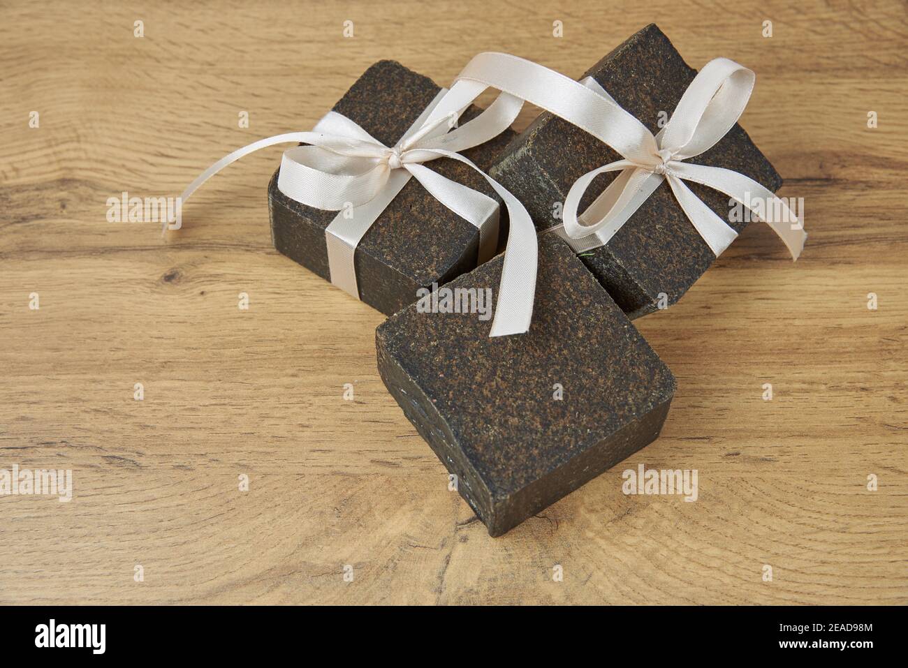 Handmade soap-scrub decorated with ribbons. Personal hygiene items ...