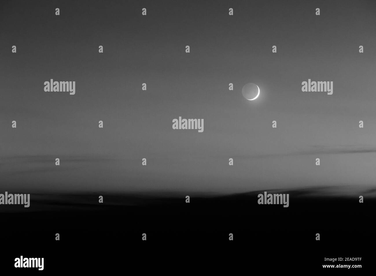 Dusk sky landscape and moon Stock Photo - Alamy