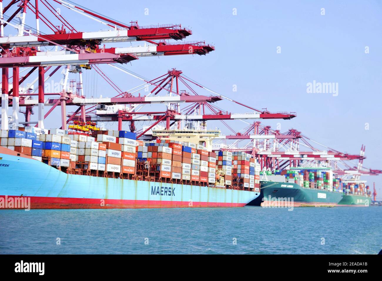 QINGDAO, CHINA - FEBRUARY 9, 2021 - A container liner loads and unloads ...