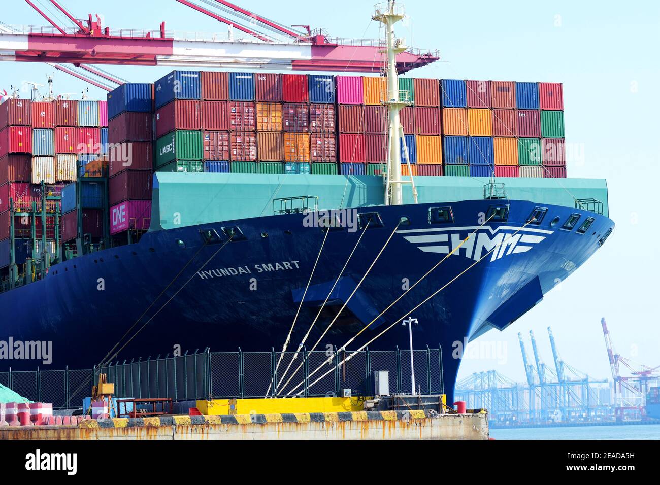 QINGDAO, CHINA - FEBRUARY 9, 2021 - A container liner loads and unloads ...