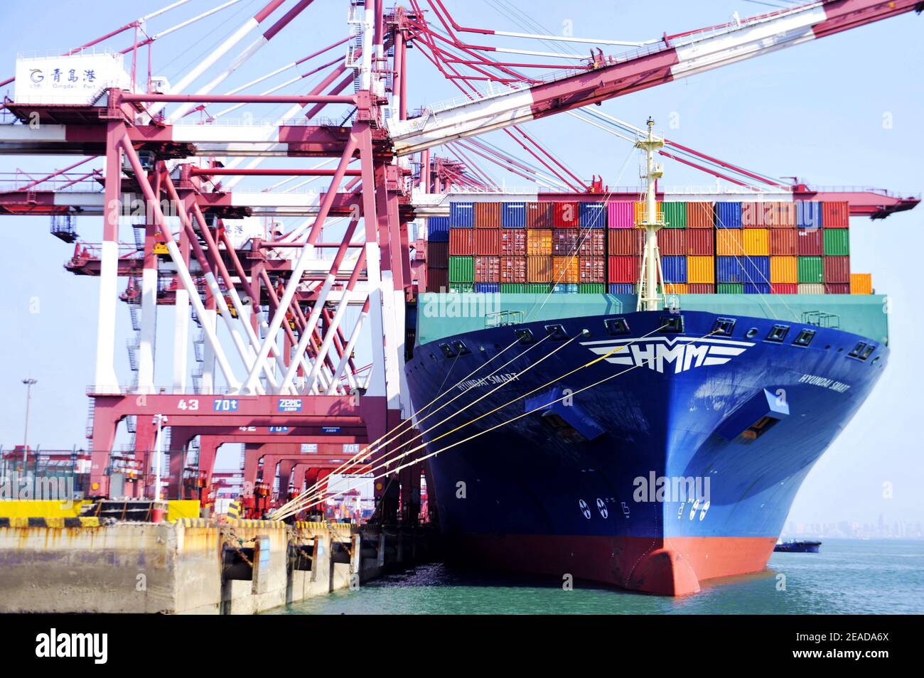 QINGDAO, CHINA - FEBRUARY 9, 2021 - A container liner loads and unloads ...