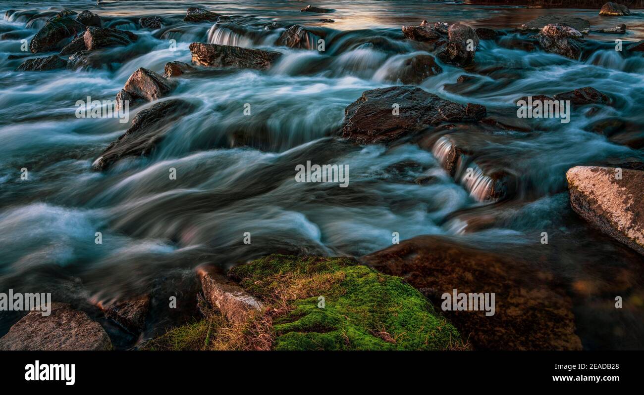 Colorful flowing water. Long exposure of flowing water Stock Photo - Alamy