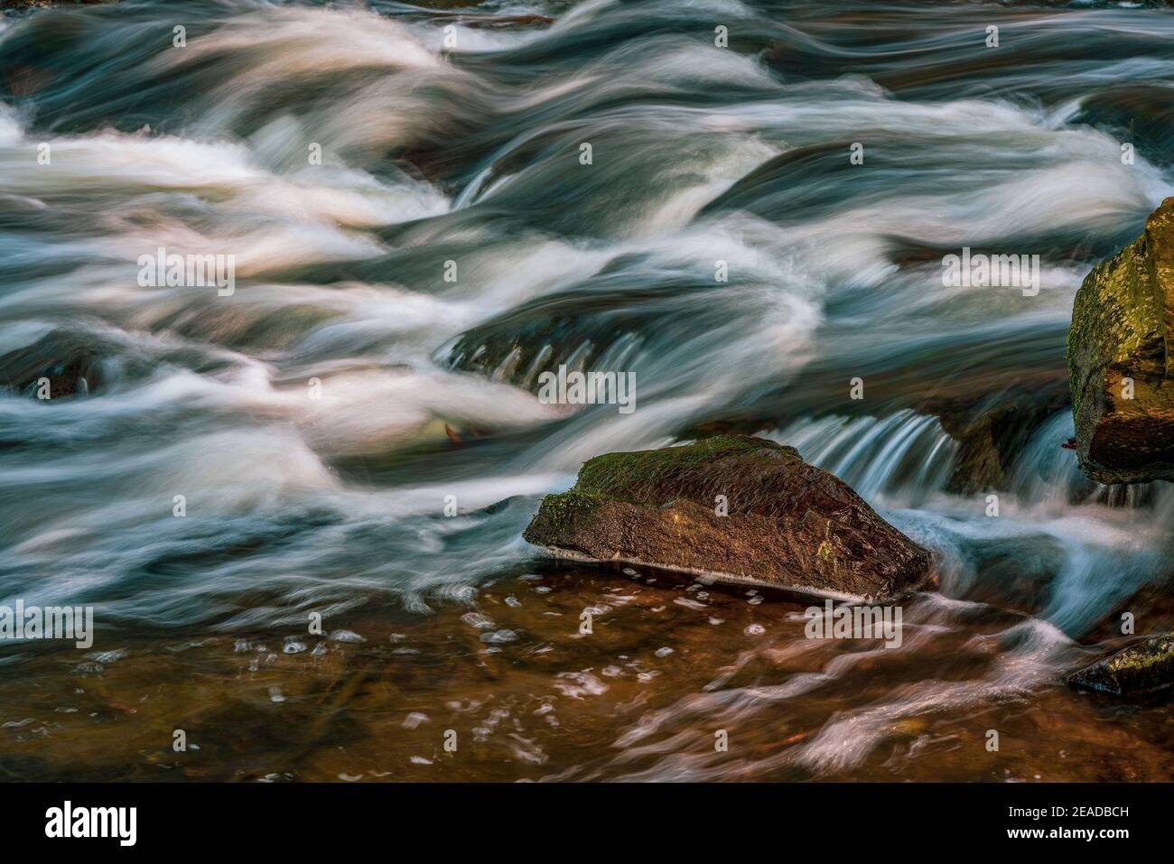 Colorful flowing water. Long exposure of flowing water Stock Photo - Alamy