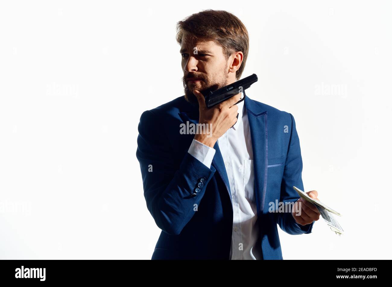rich man with gun and wad of money classic suit white background Stock ...