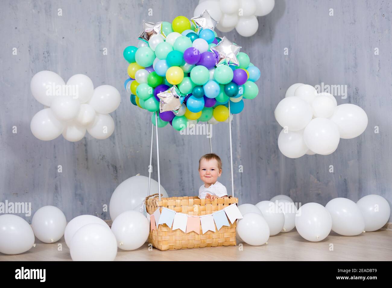 childhood, dreaming and creativity concept - cute little girl sitting ...