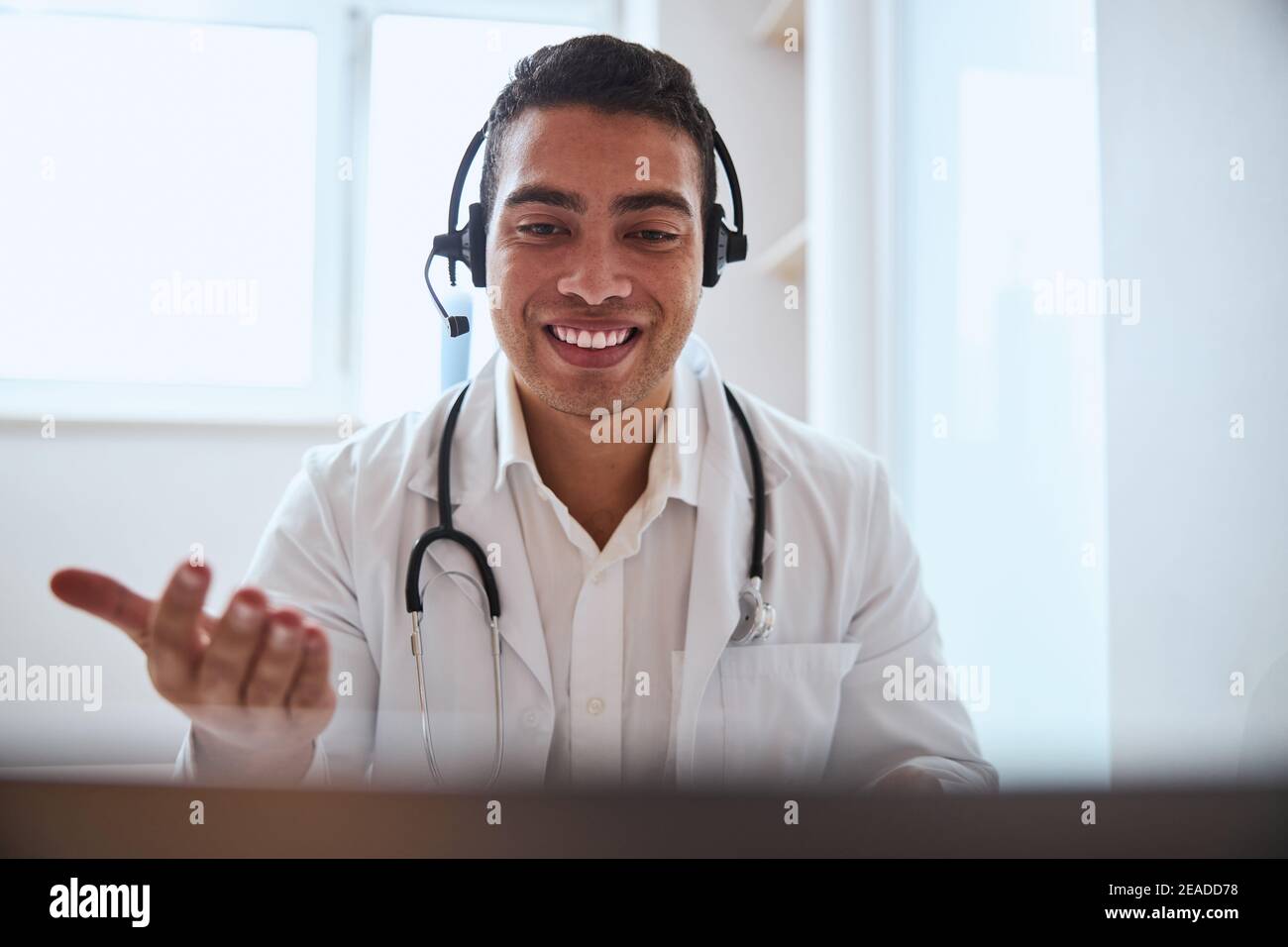 Professional male doctor giving recommendation and consultation for ...
