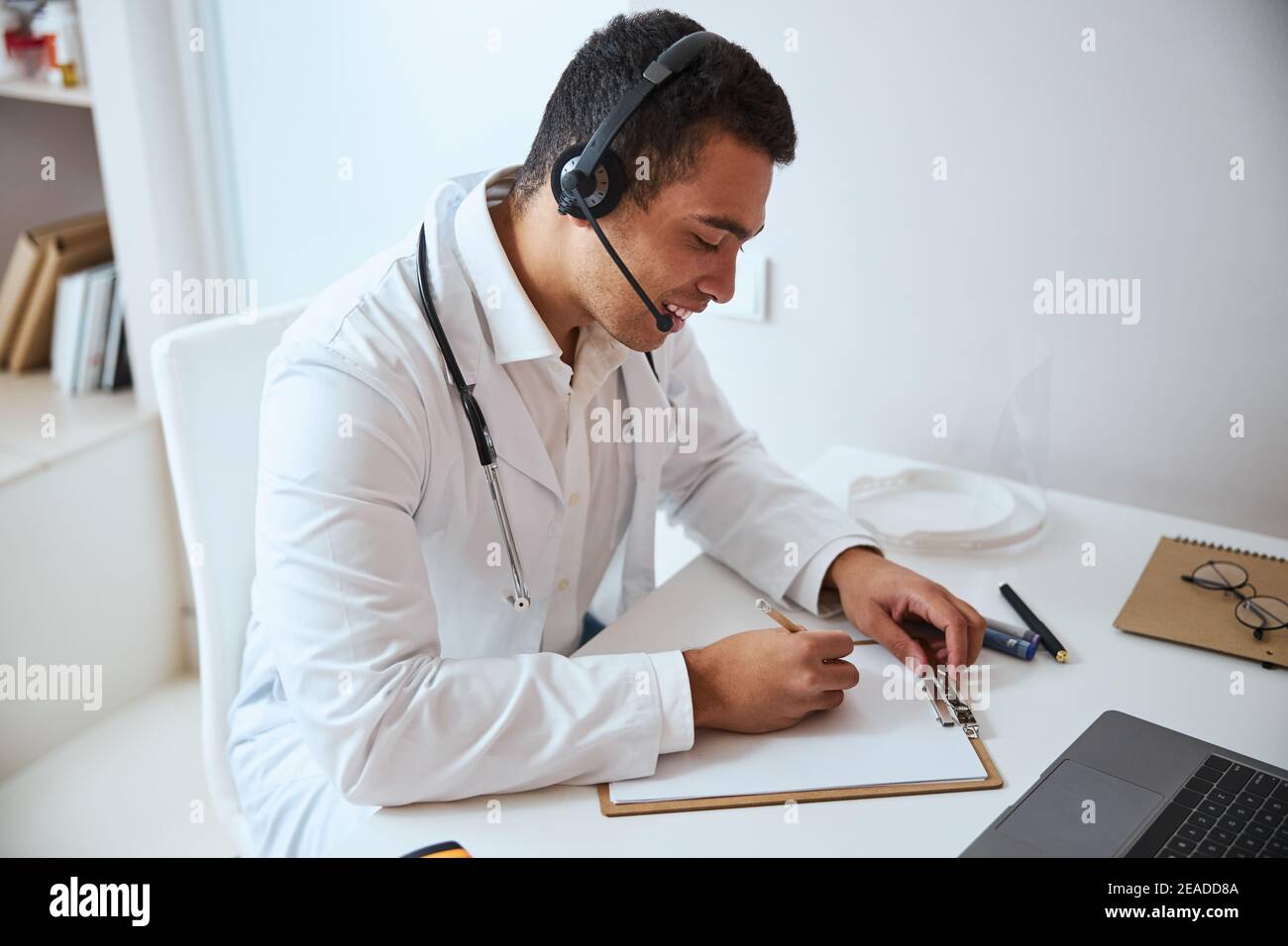 Male doctor doing medical consultation hi-res stock photography and ...