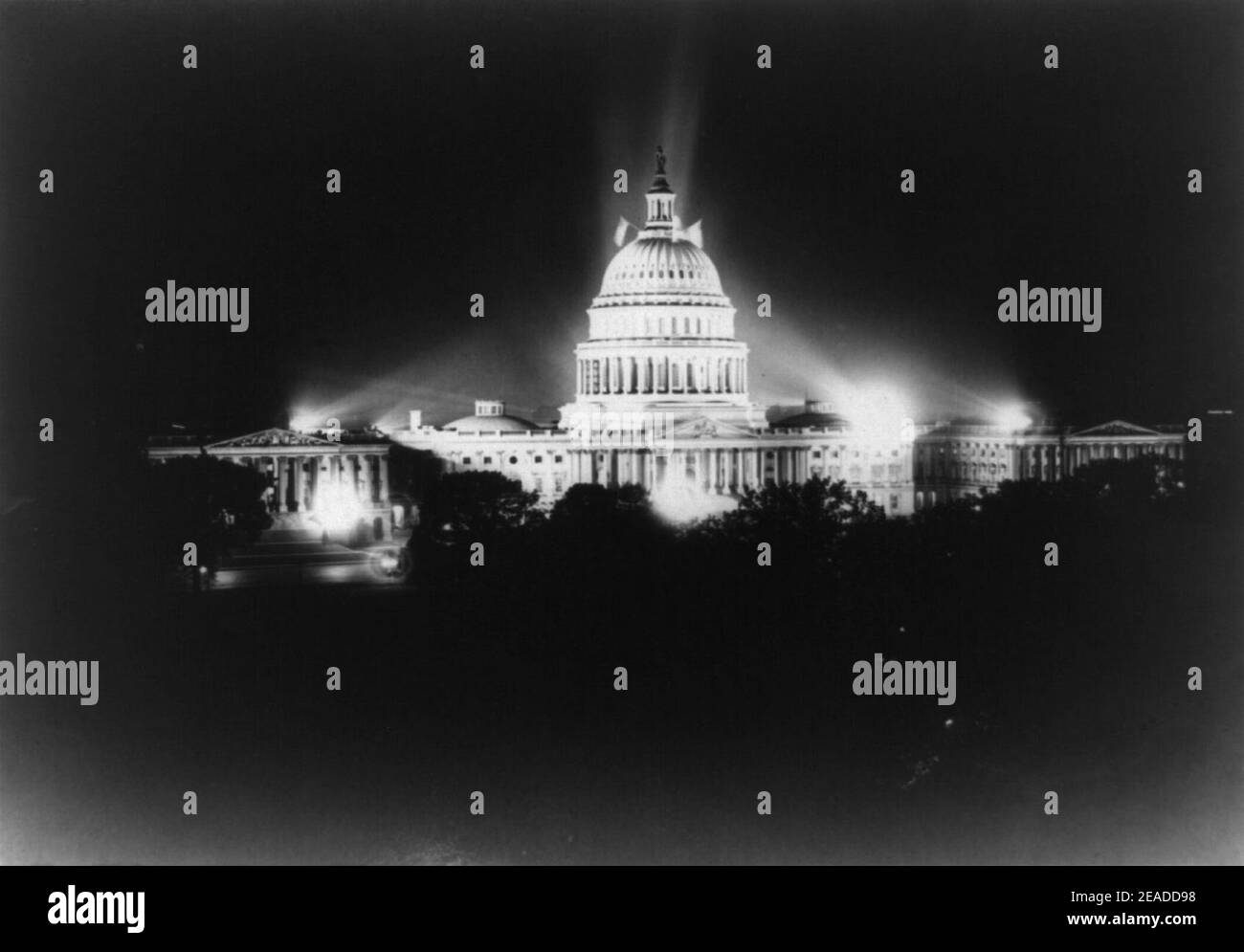 Night view of the U.S. Capitol with lights shining on it Stock Photo ...