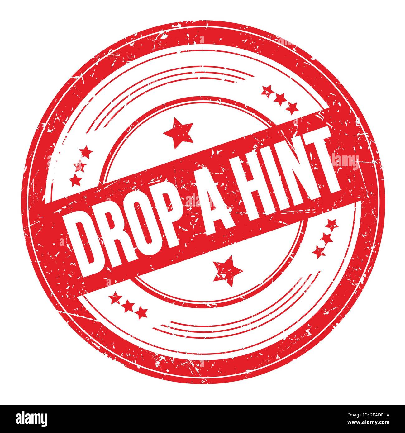 DROP A HINT text on red round grungy texture stamp Stock Photo - Alamy