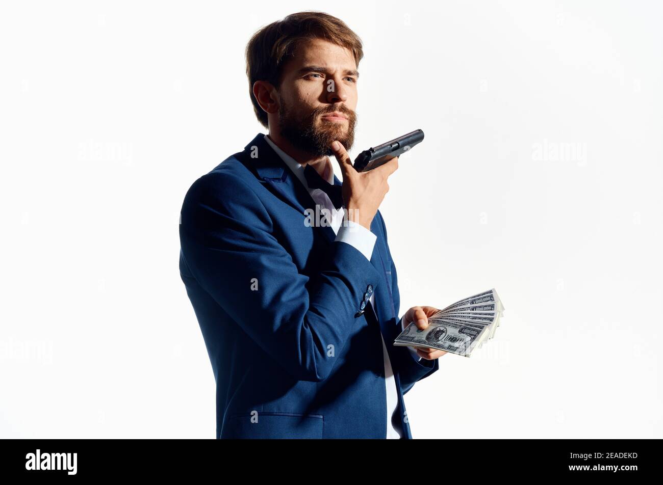 rich man with gun and wad of money classic suit white background Stock ...