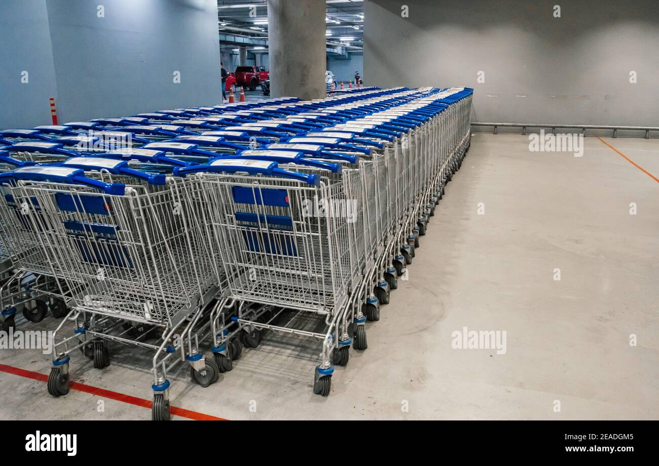 Row of shopping cart in store Stock Photo - Alamy