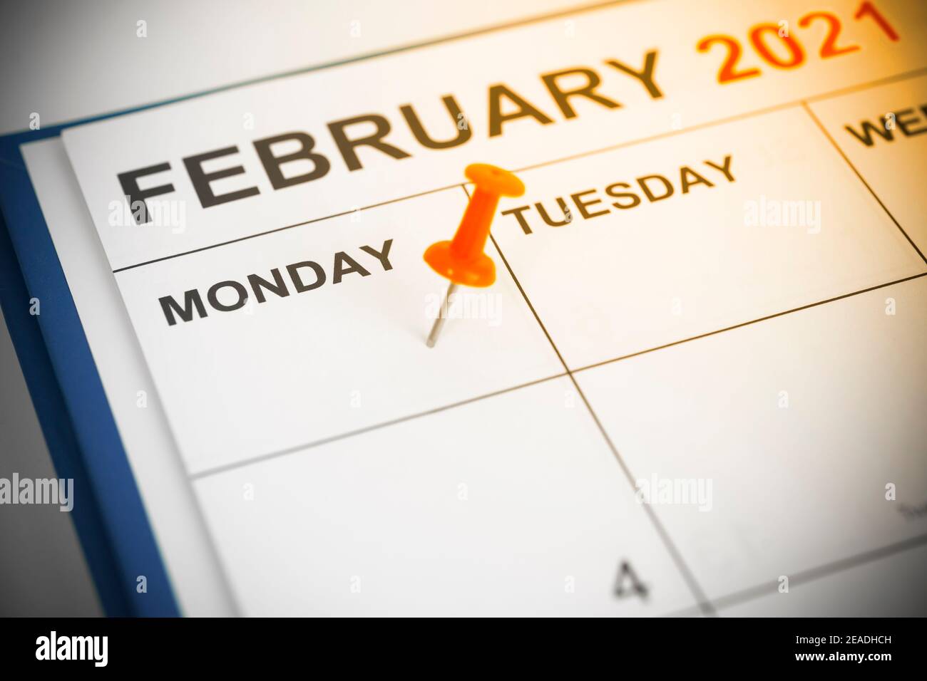 Red push pin on calendar Monday Stock Photo - Alamy