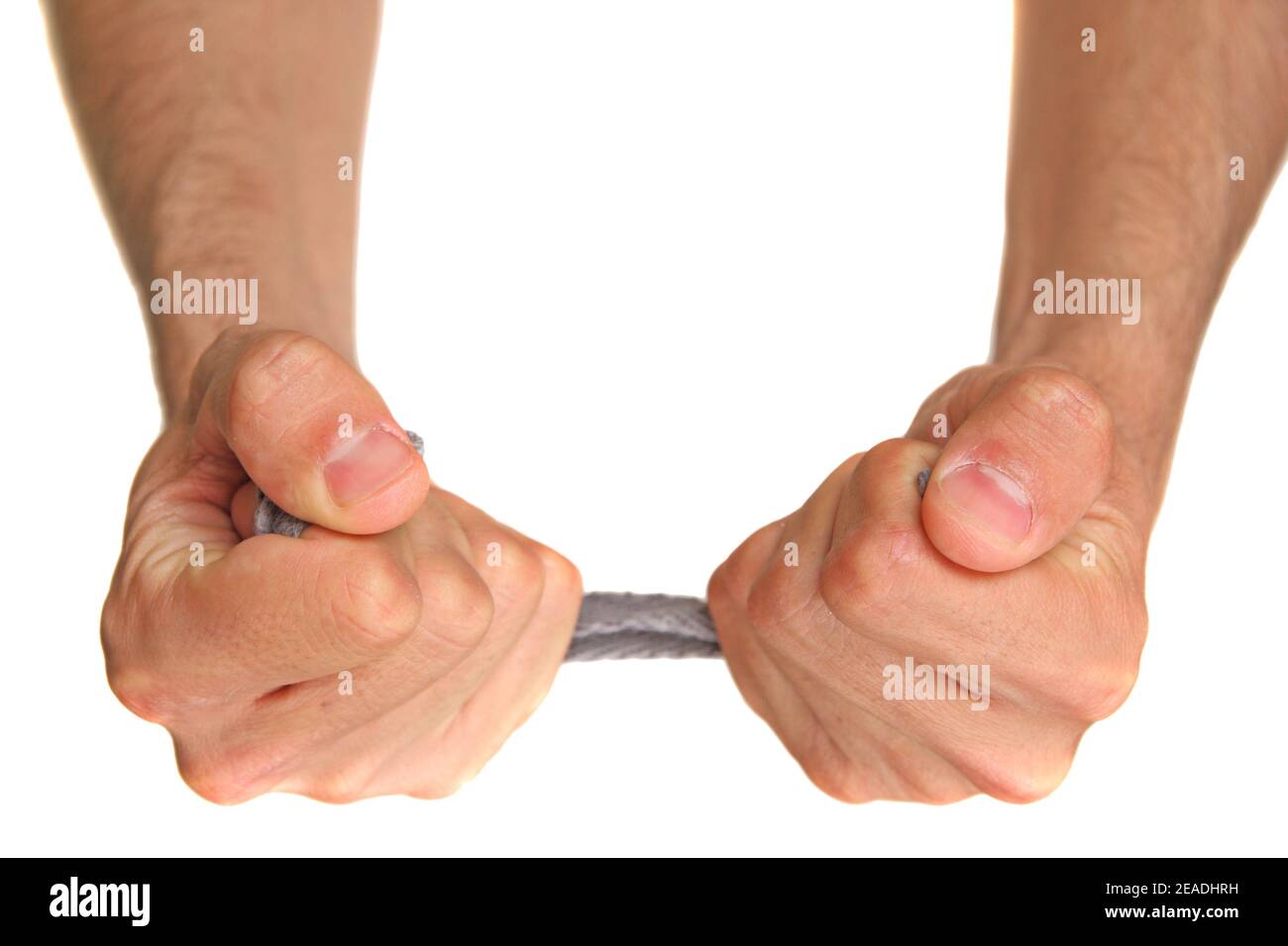 Coseup view of hands tightening rope over white background Stock Photo ...