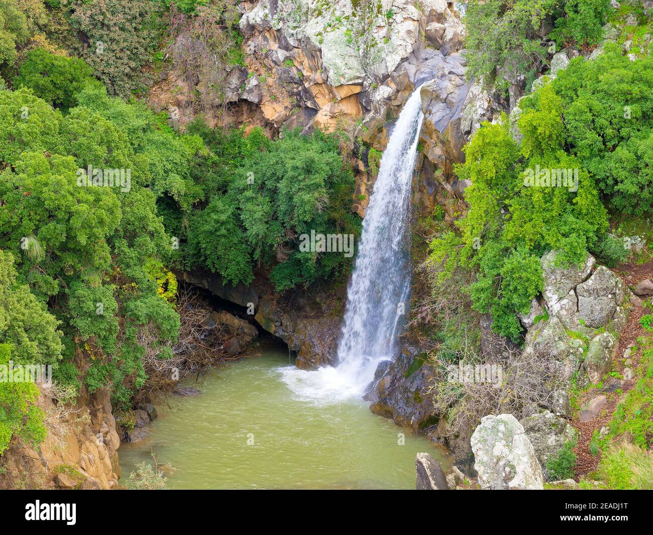 Waterfall with Rain and Snow waters plummeting down the stream ...