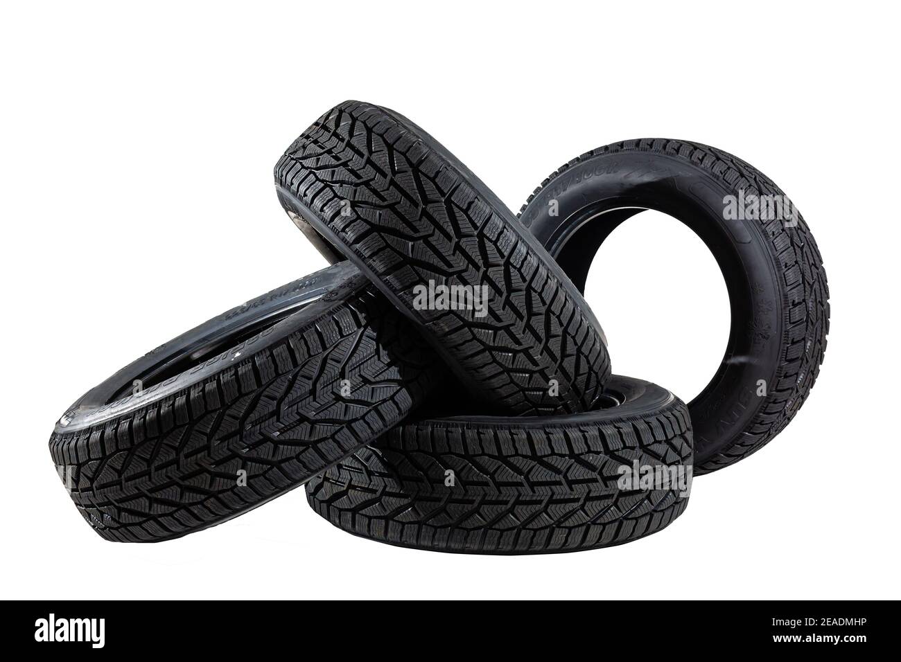 Four tires on the white background Stock Photo - Alamy
