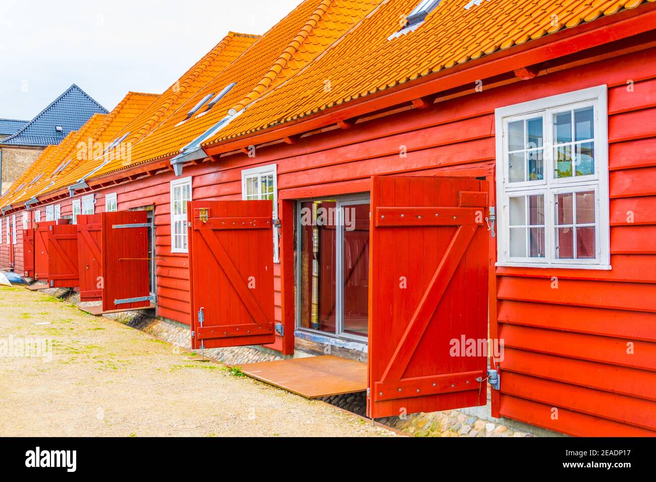 View of red wooden houses in port area of the danish capital Copenhagen ...