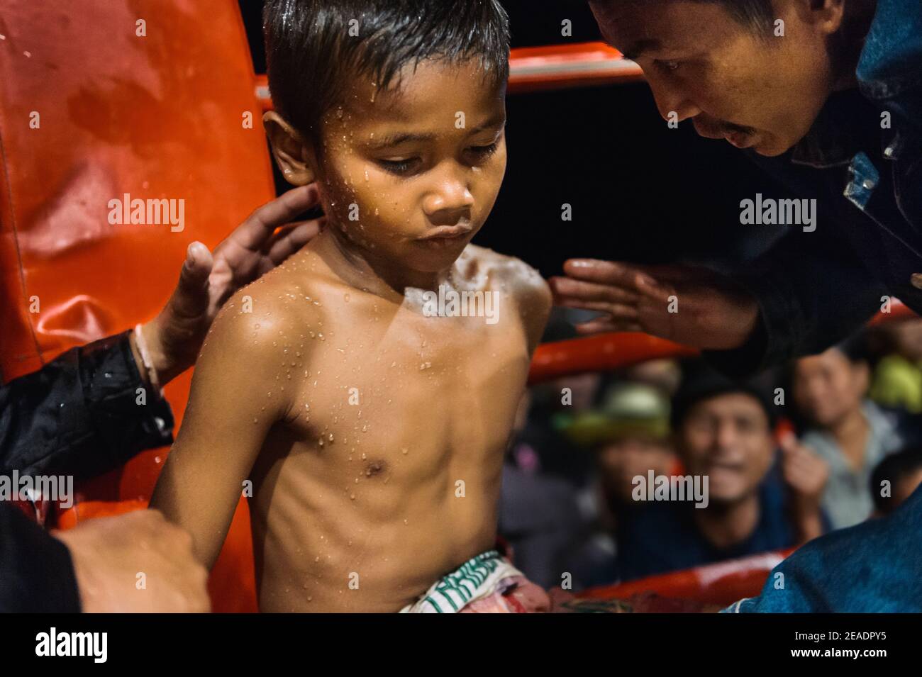 Muay Thai child fighter between rounds in a fight Stock Photo - Alamy