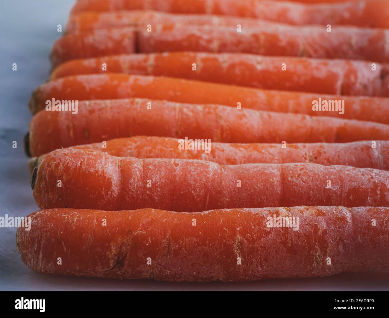 orange food background. close-up of carrots. Bunch of orange organic ...