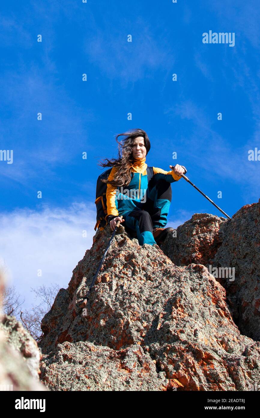 Female taking a break during her outdoor activities Stock Photo - Alamy