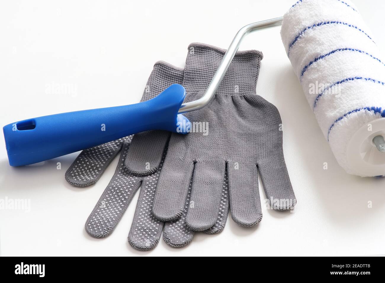 Paint roller, protective gloves, everything for repair and painting ...