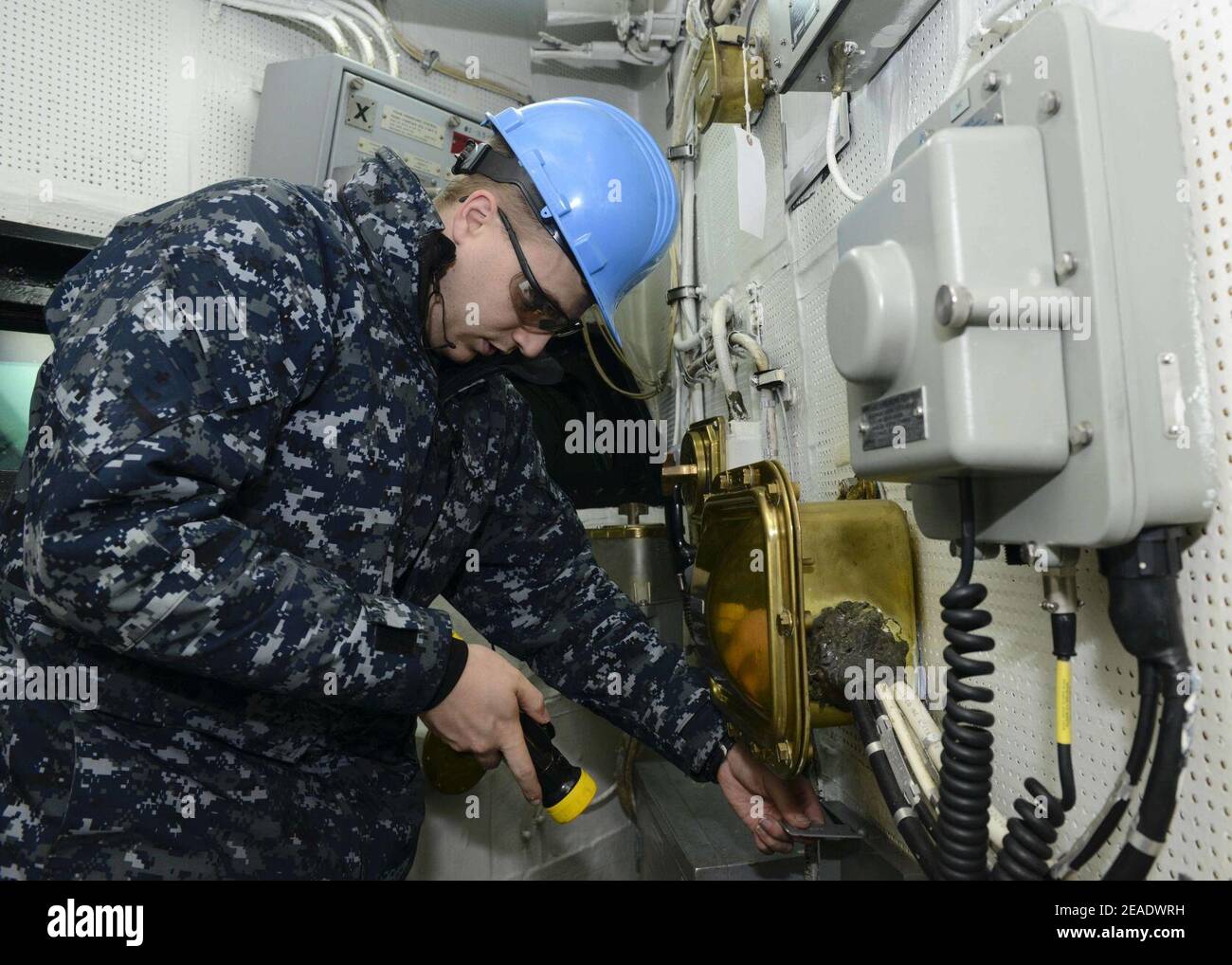 Nimitz Sailor inspects conflag station 151123 Stock Photo - Alamy
