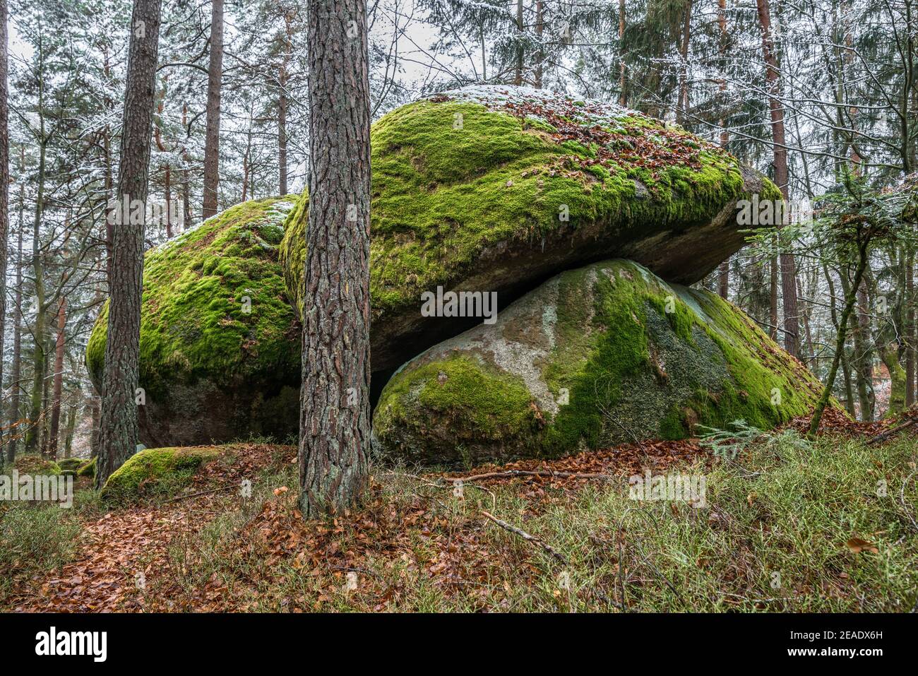 Ancient weathered megalithic granite rock formation with cave and ...