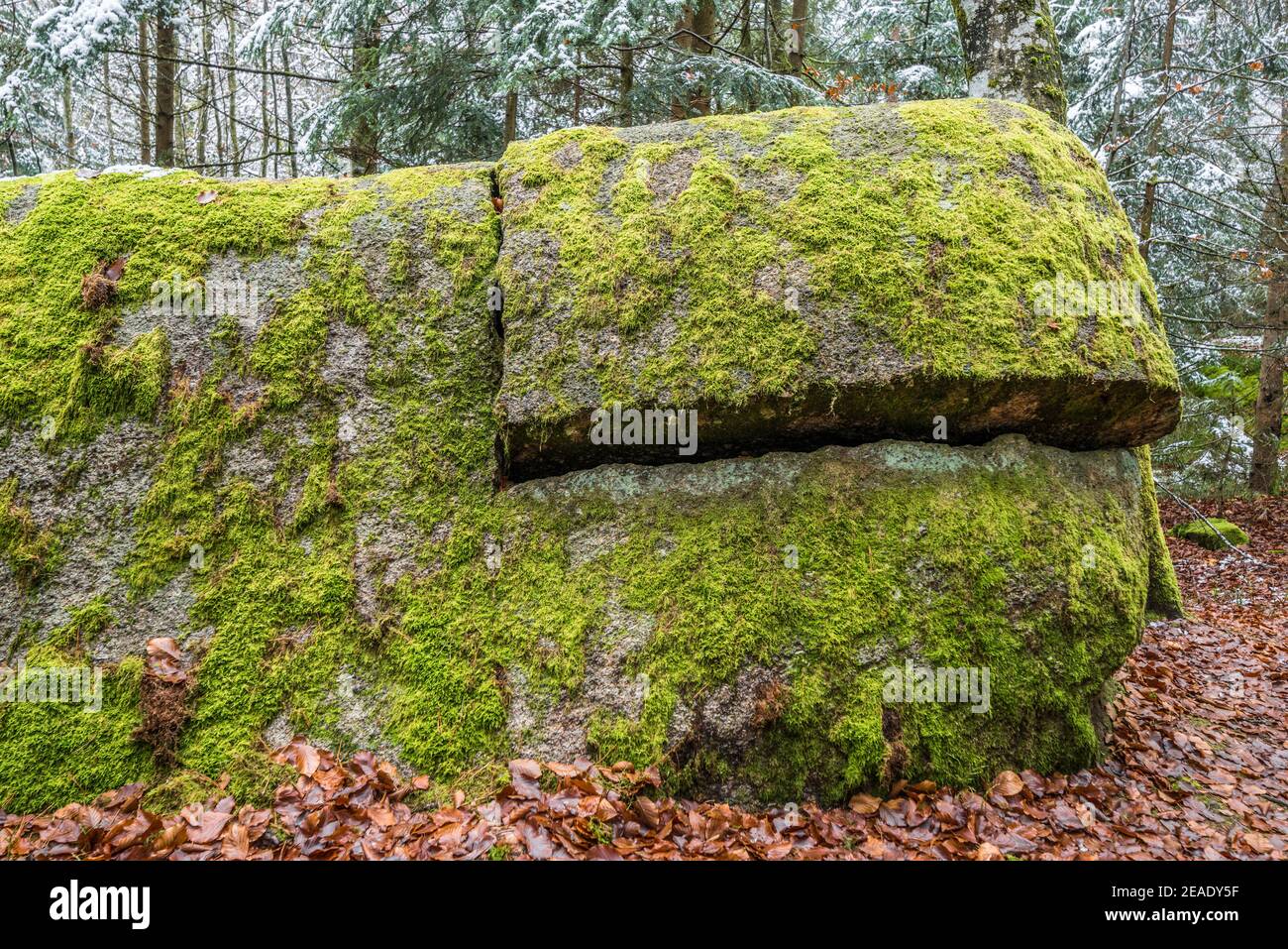 Ancient weathered megalithic granite rock formation with cave and ...