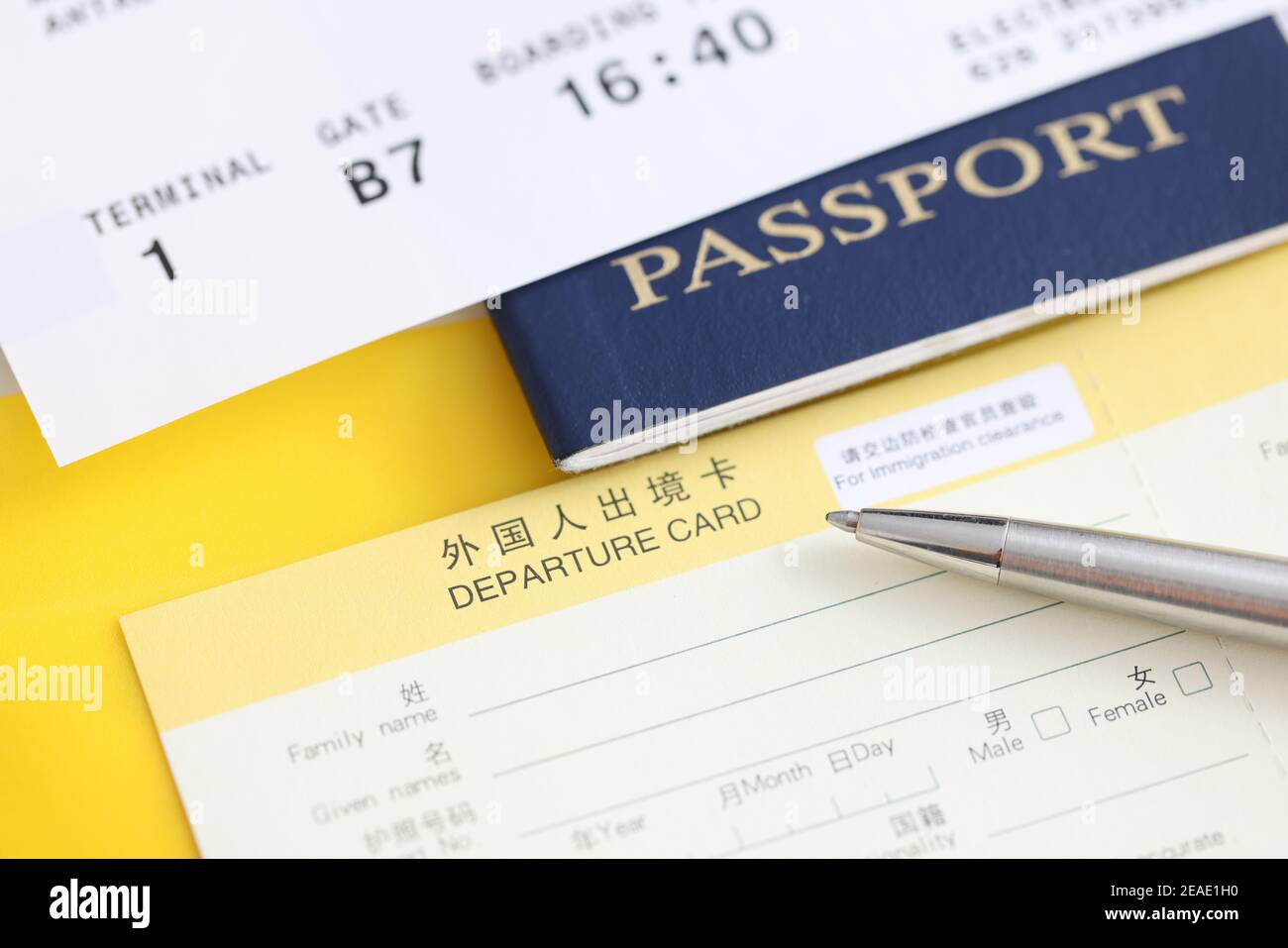 On table is passport, ticket and form for departure Stock Photo - Alamy