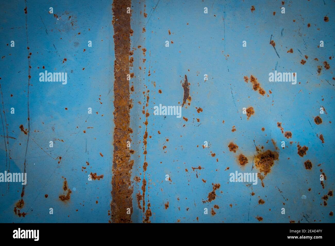 Rusted blue painted metal wall. Rusty metal background with streaks of ...