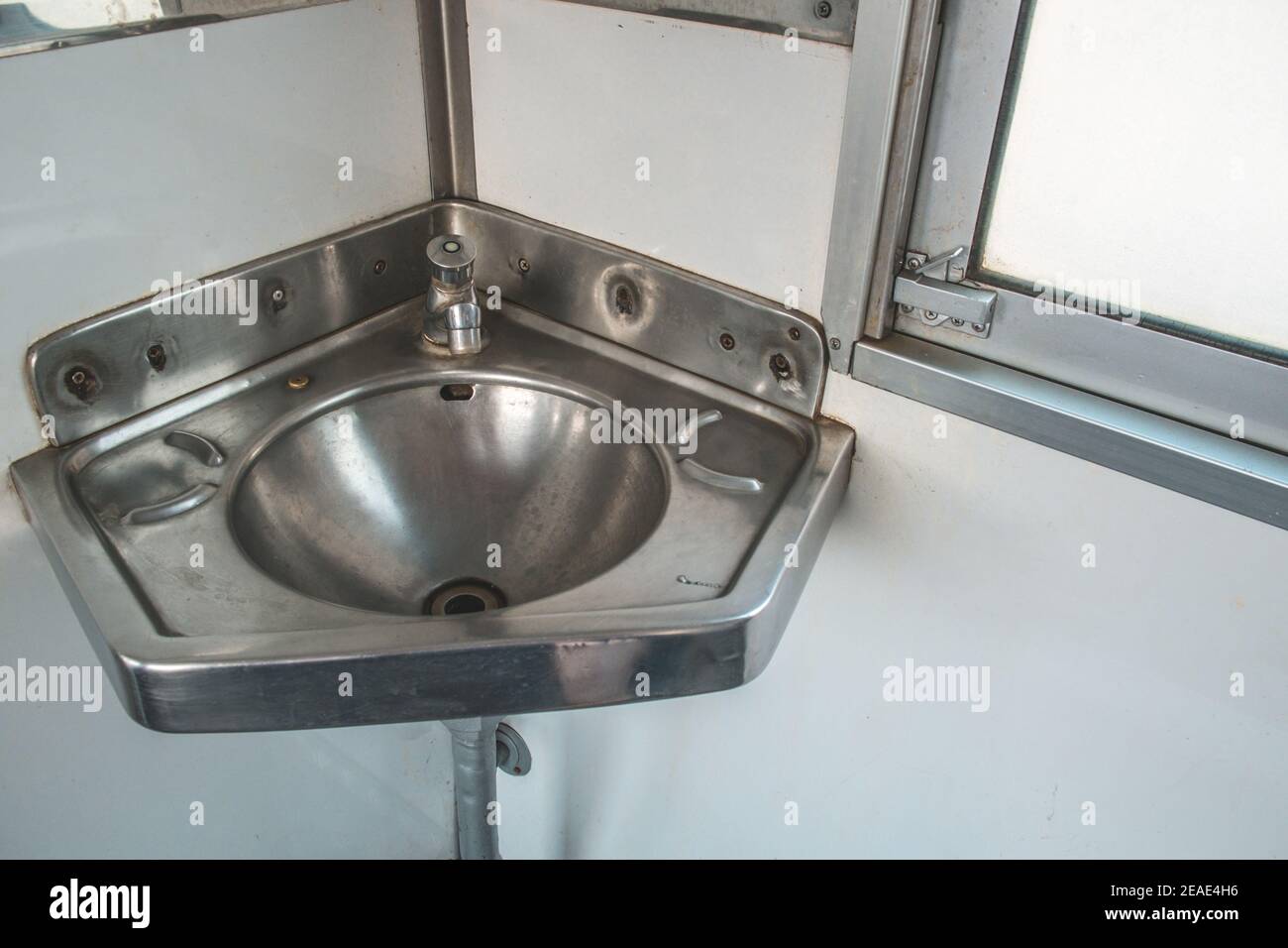 Stainless steel sink in the corner on the train Stock Photo - Alamy