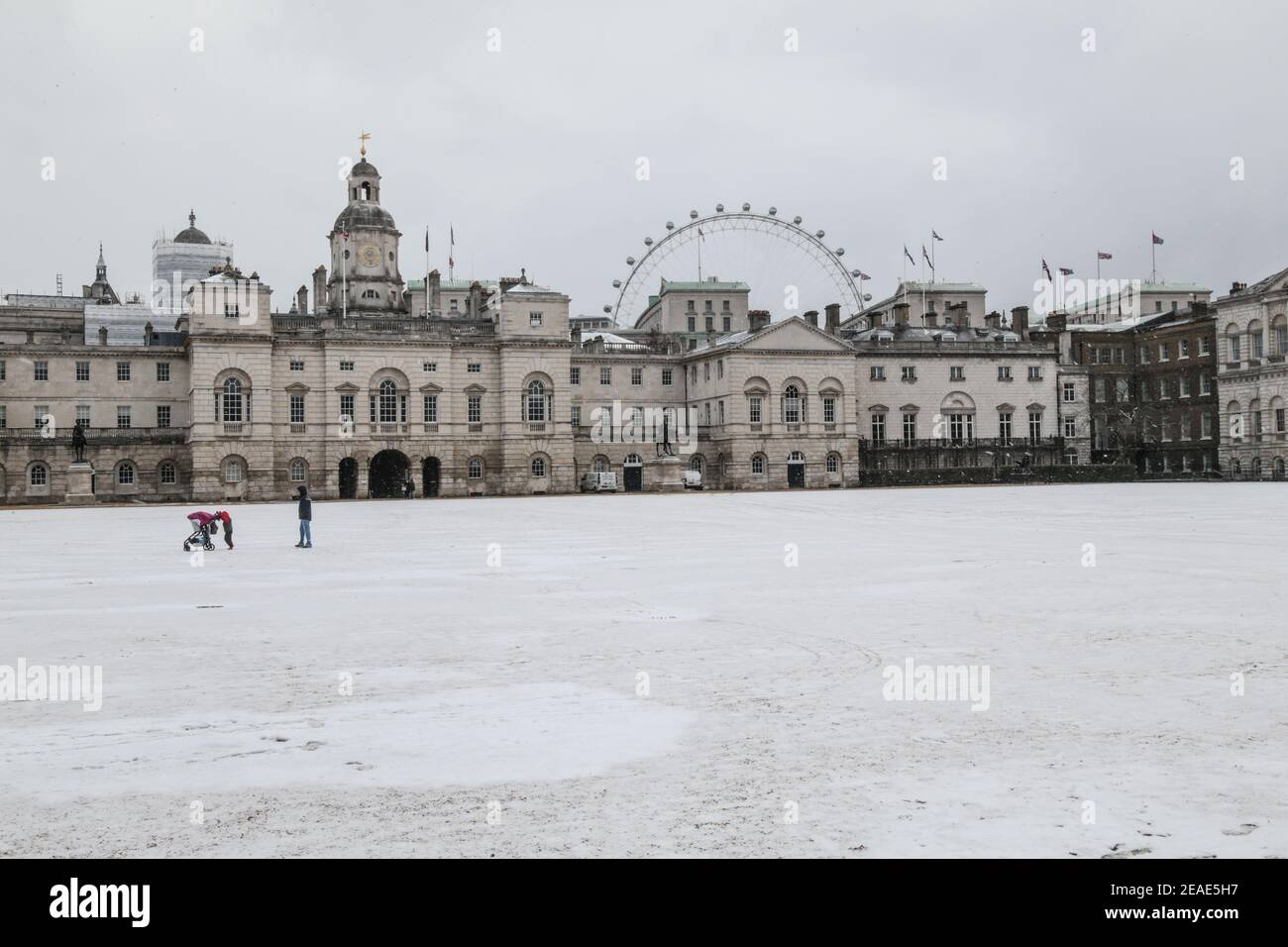 London, UK. 09th Feb, 2021. Heavy snow and cold in London, a man with ...