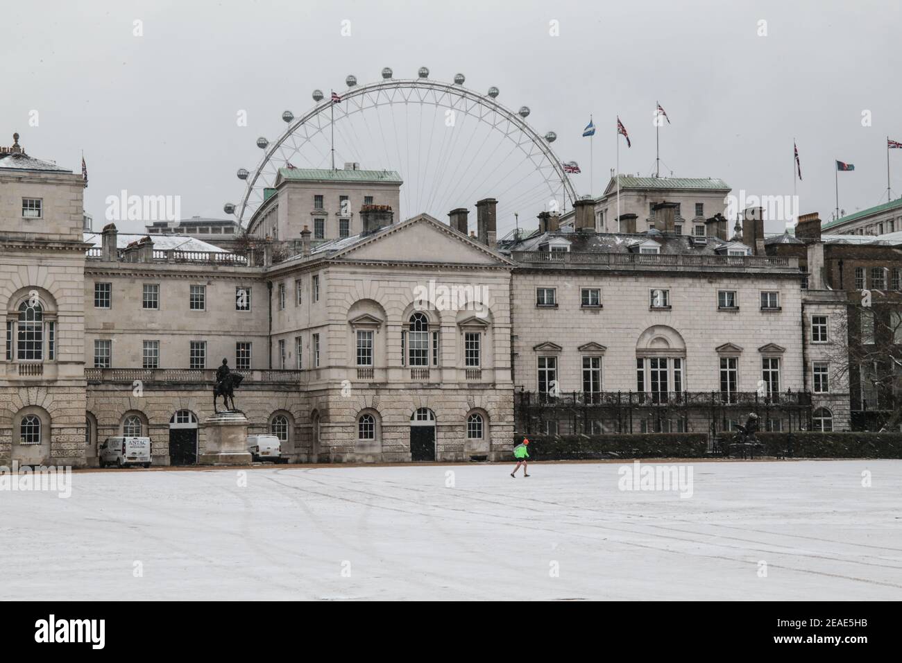 London, UK. 09th Feb, 2021. Heavy snow and cold in London, a man ...