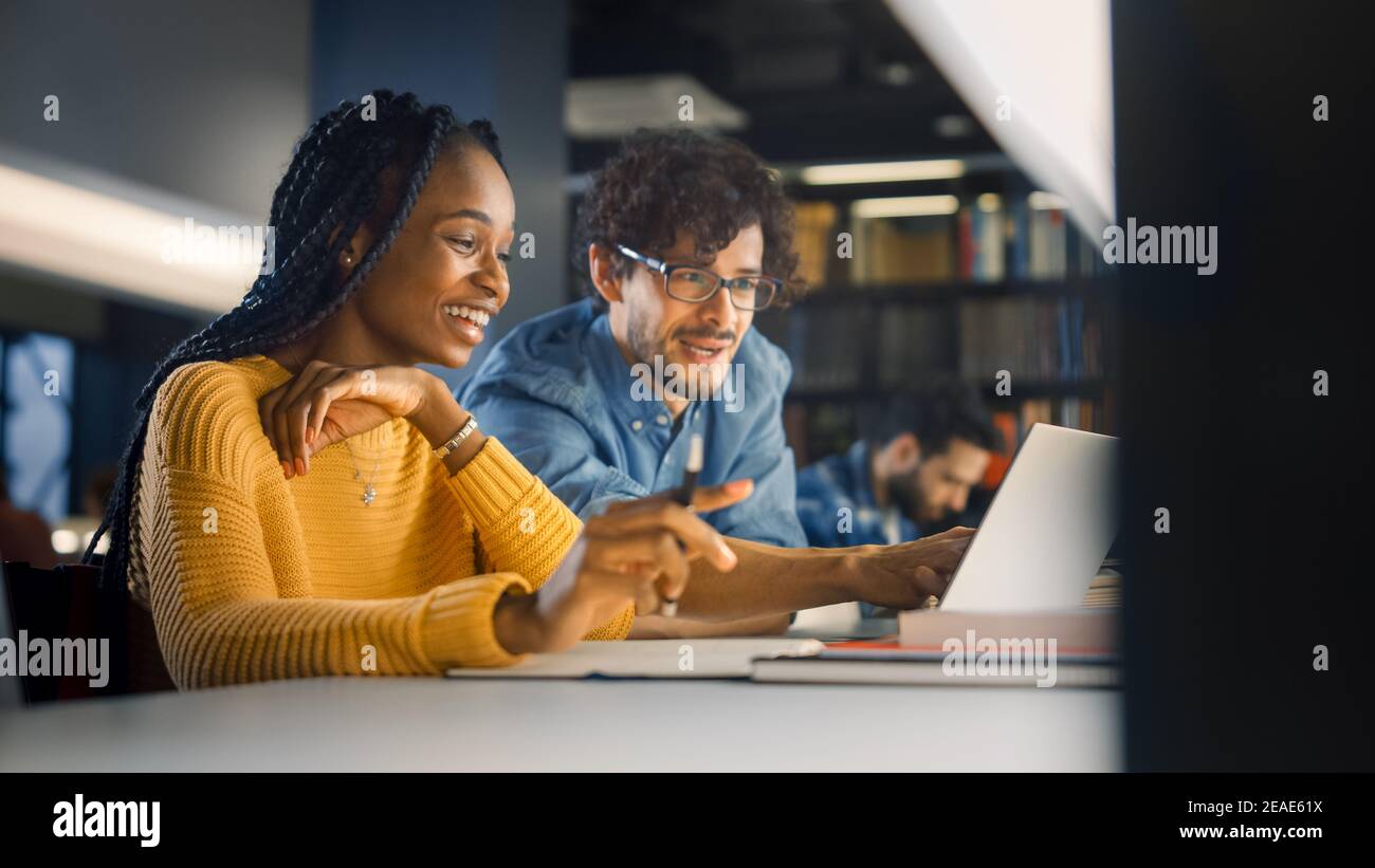 University Library: Gifted Black Girl uses Laptop, Smart Classmate ...