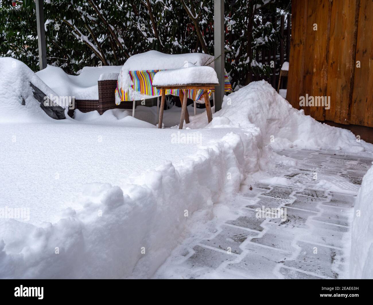 Garden and terrace completely covered with snow Stock Photo - Alamy